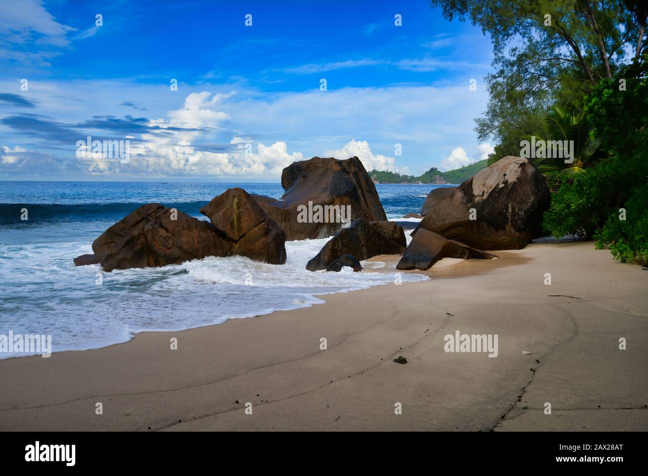 Ocean waves and granite rocks - Baie Lazare beach, Mahe Island ...
