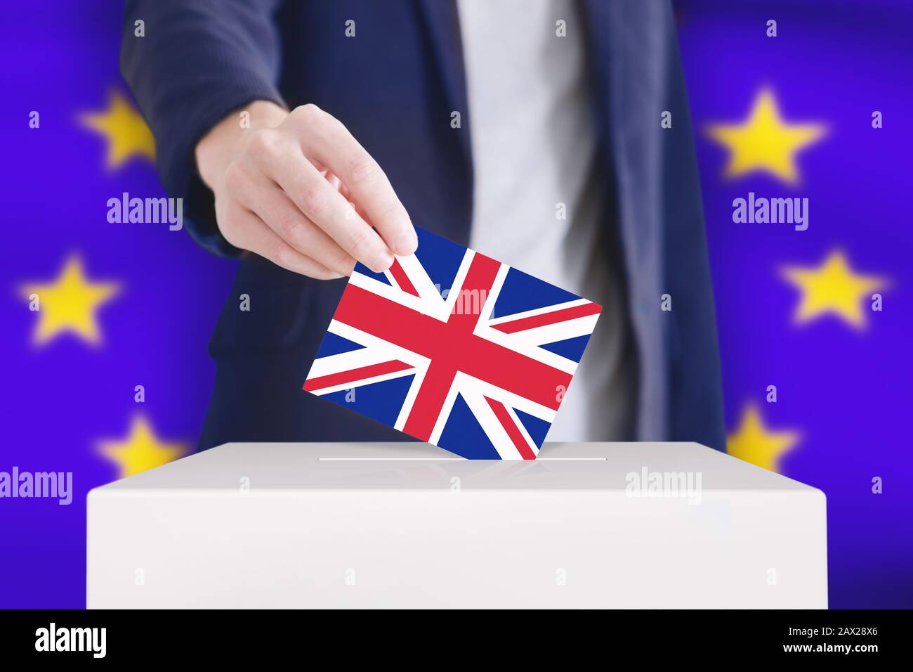 Man putting a ballot with British Flag into a voting box with European ...