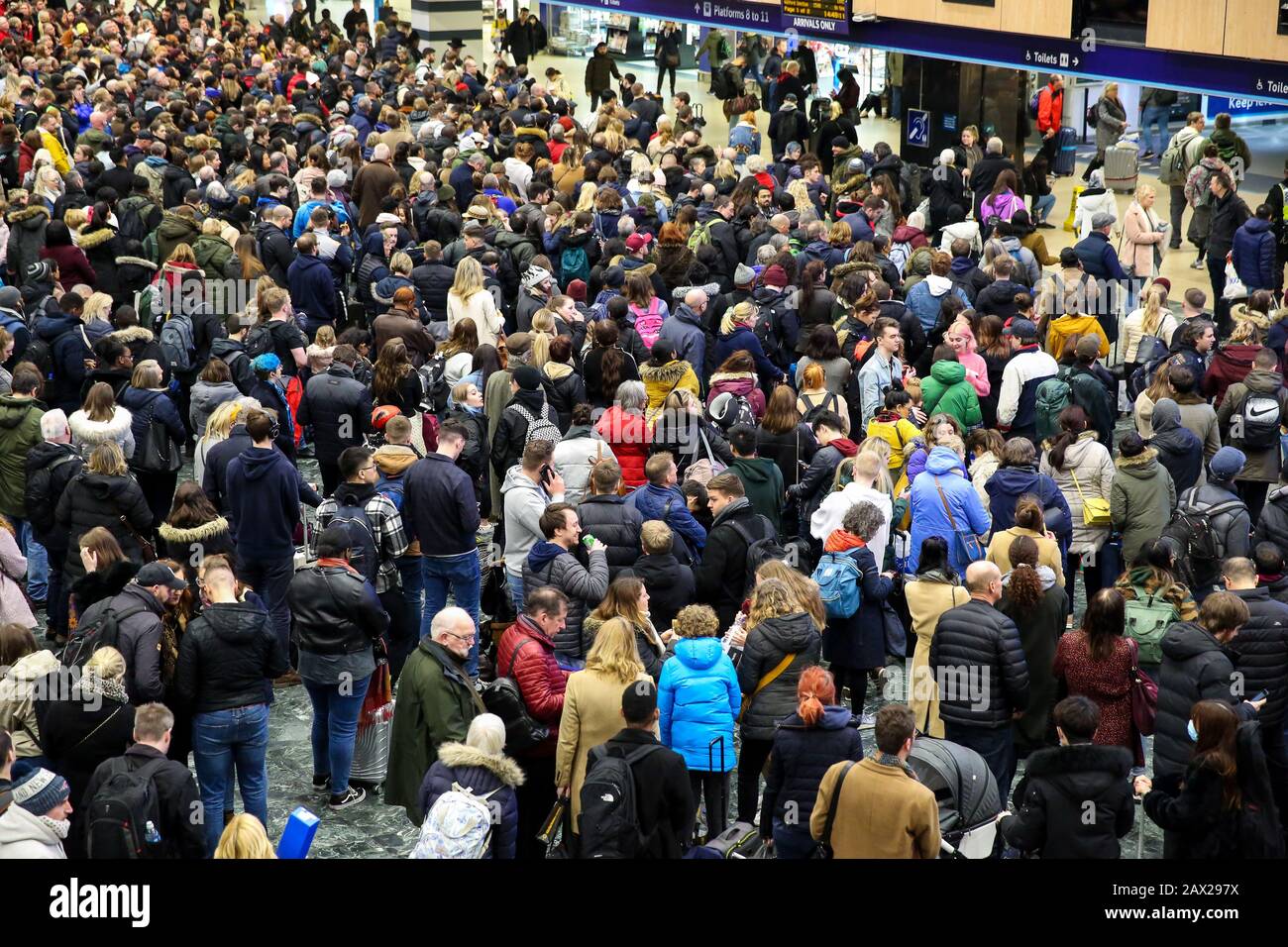 People overcrowd at London Euston rail station as number of trains were ...