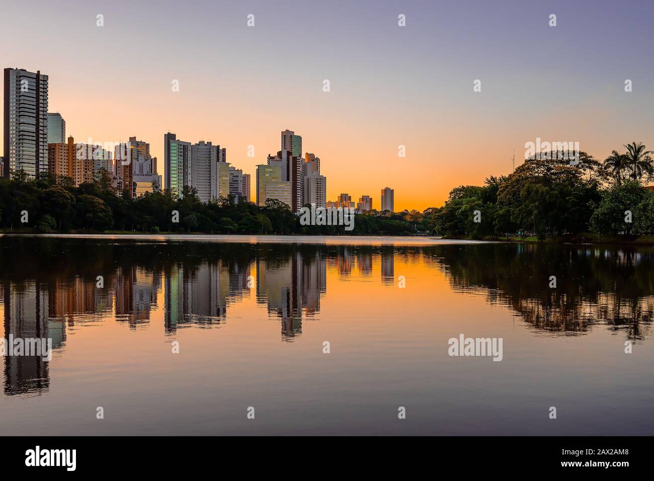 Beautiful lake of a Brazilian modern city during the sunset. Sunset at ...