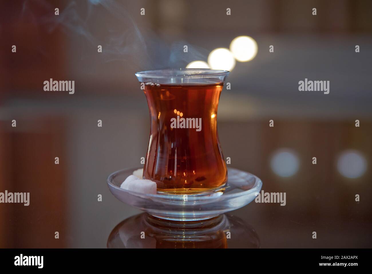 Tea in Azerbaijani traditional armudu glass. Azerbaijan black tea with ...