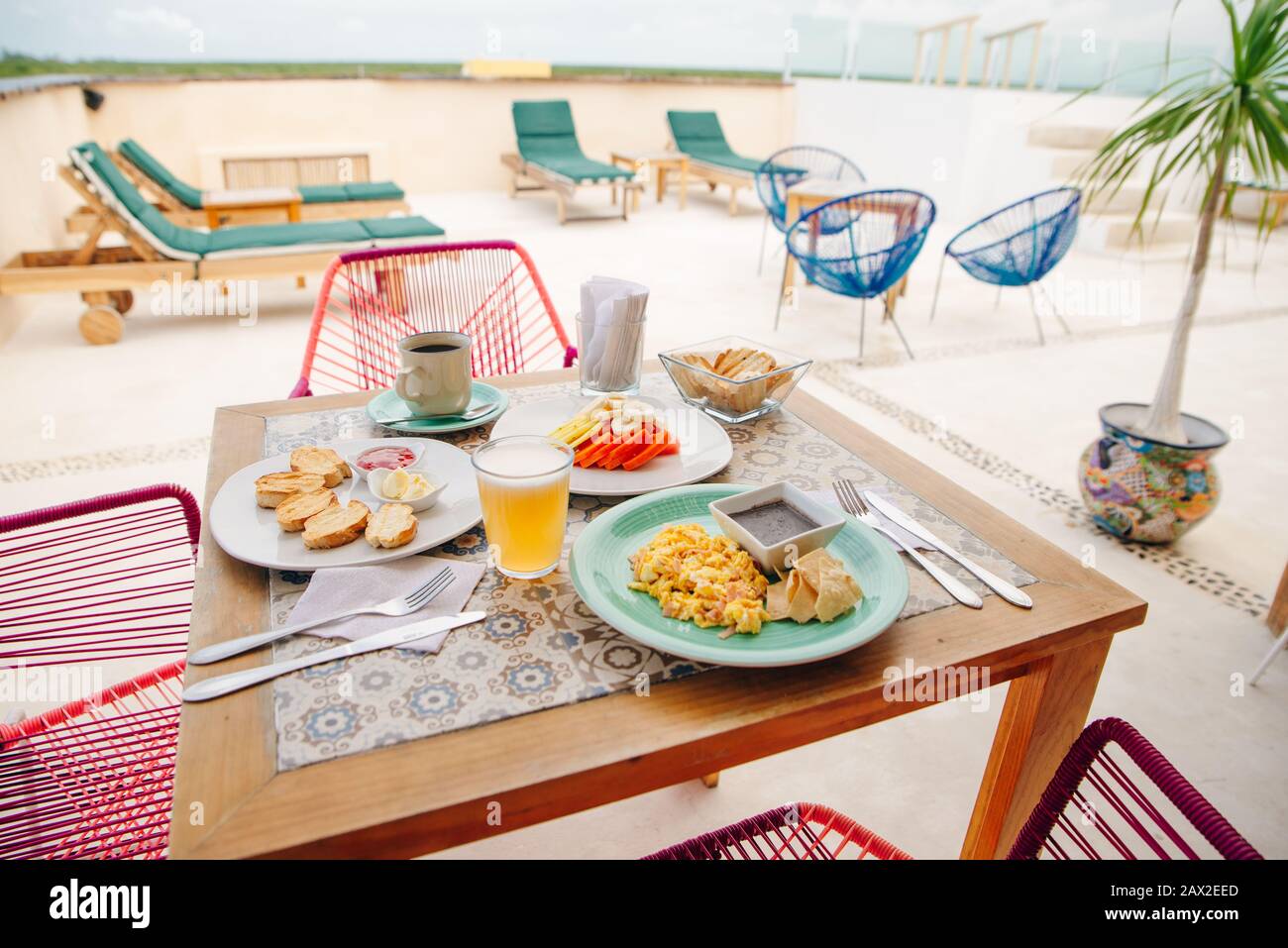 breakfast for two in the hotel with eggs, toast and fruit Stock Photo ...