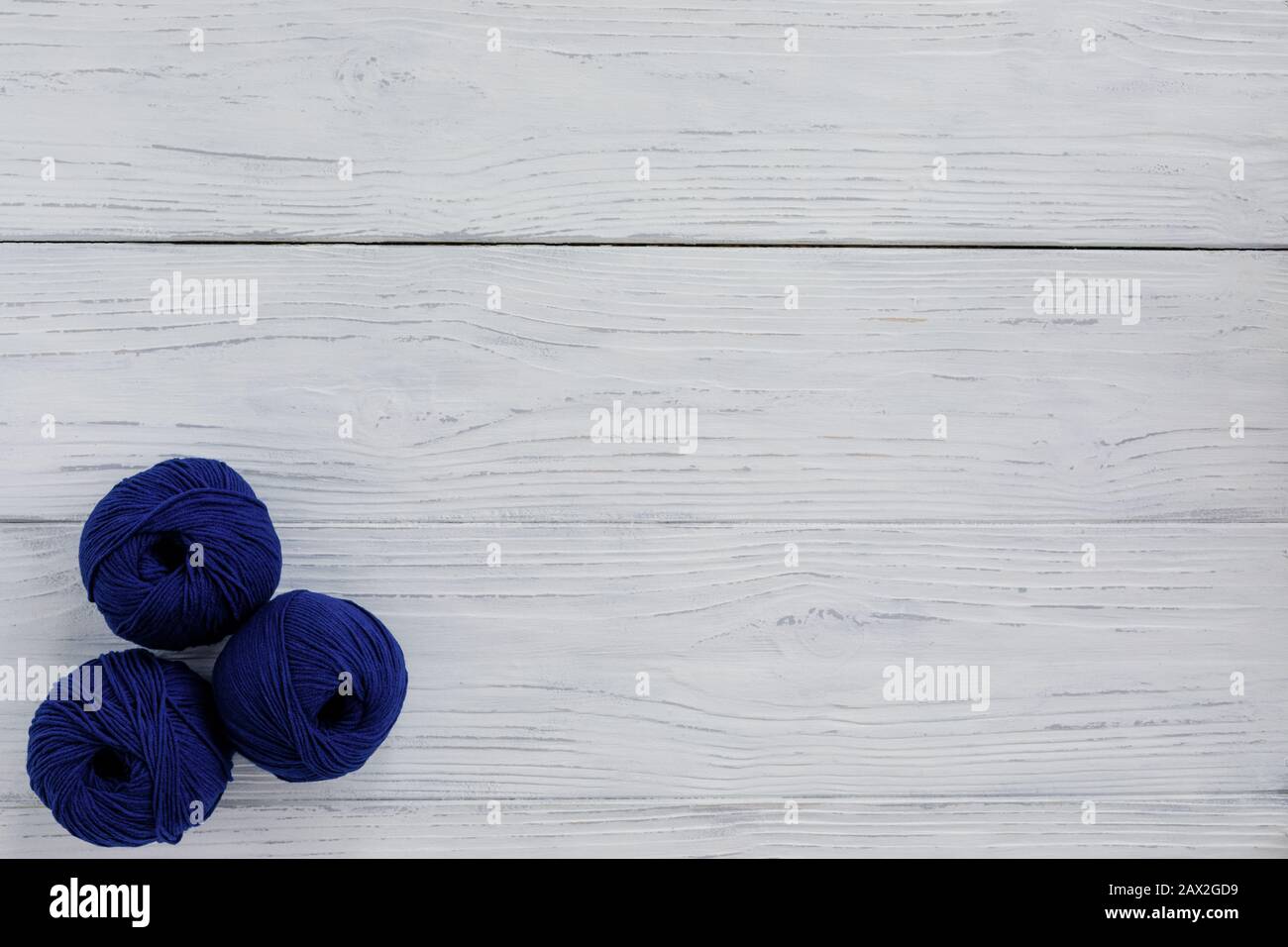 Background with classical blue skein yarn for starting a project, hobby ...