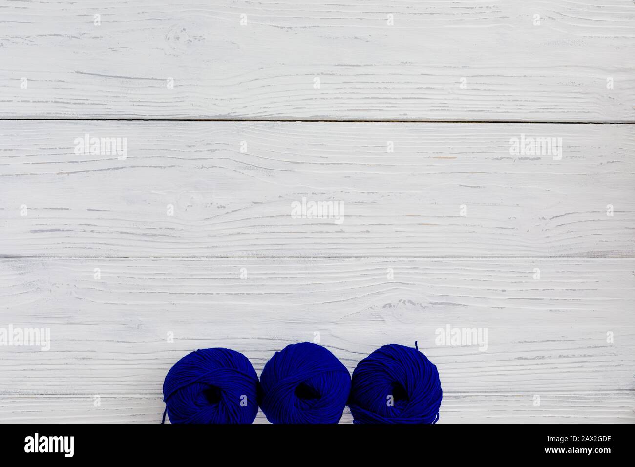 Background with classical blue skein yarn for starting a project, hobby ...