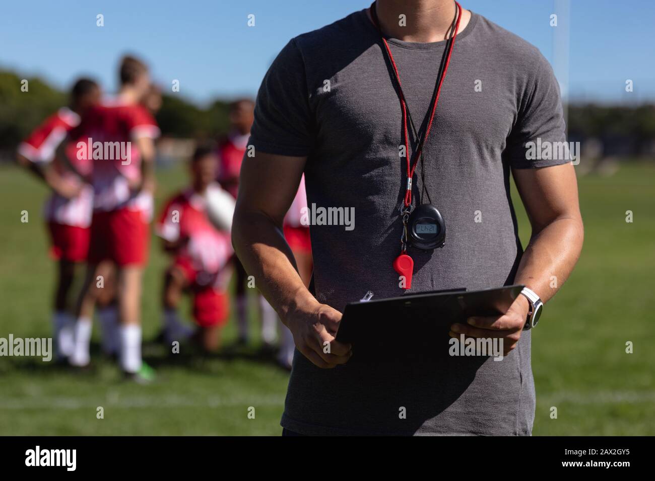 Rugby coach looking at the camera Stock Photo - Alamy