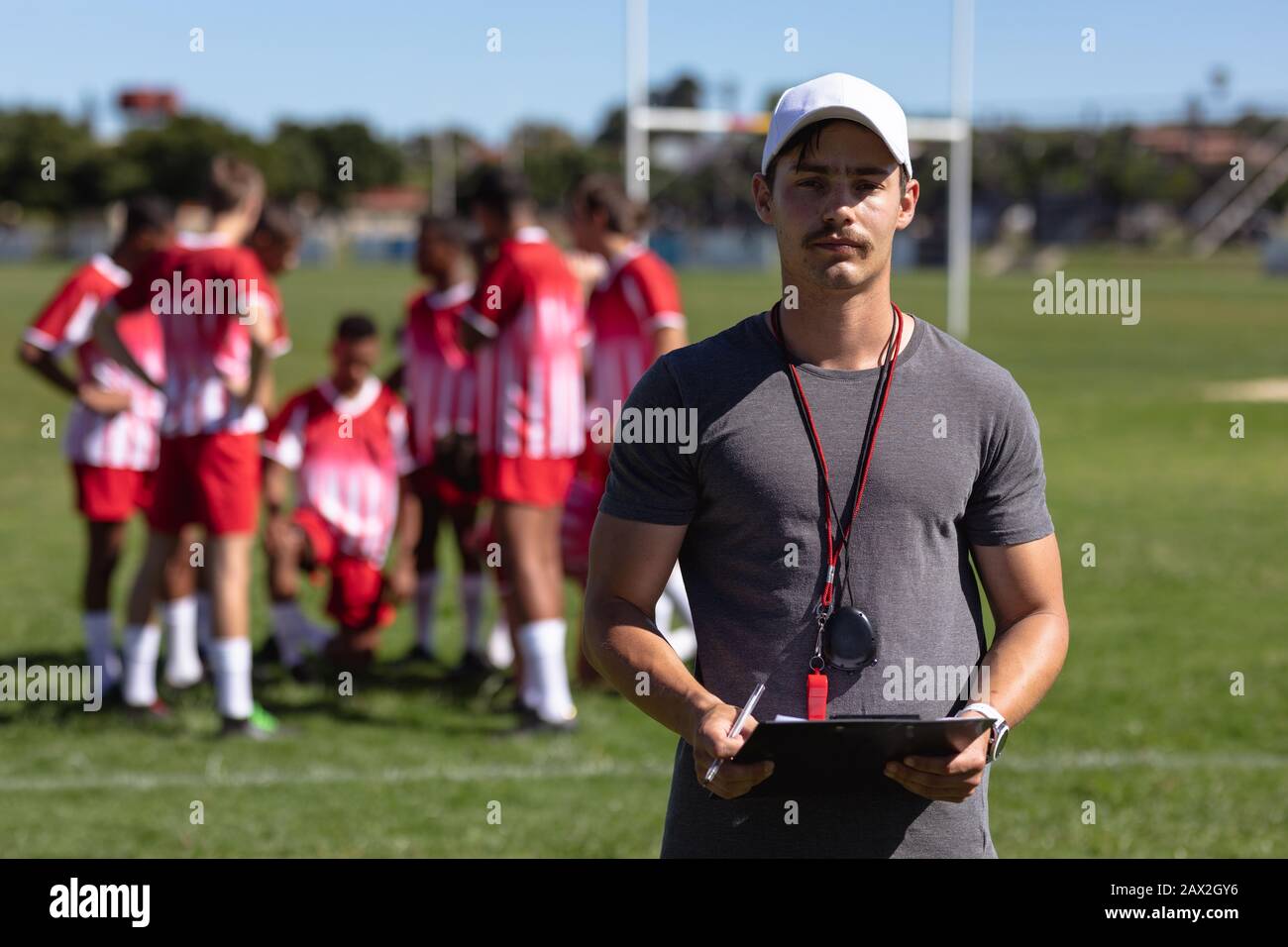 Rugby coach looking at the camera Stock Photo - Alamy