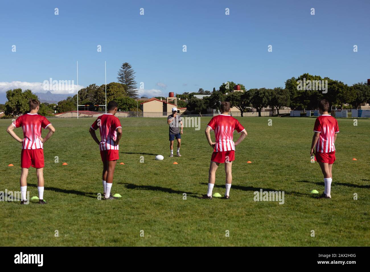 Coach hands on hips hi-res stock photography and images - Alamy