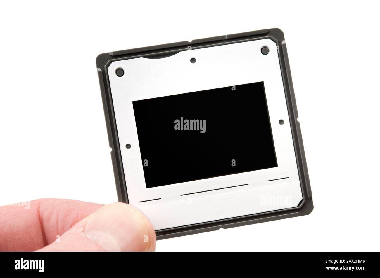 Photo slide in hand isolated on white background Stock Photo - Alamy