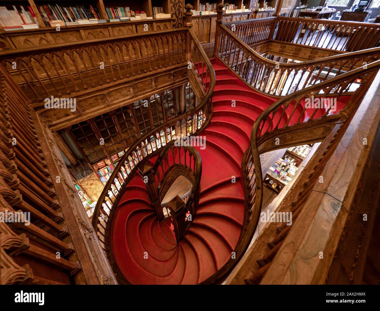 Interiors of Lello Bookstore (Portuguese: Livraria Lello) showing its ...