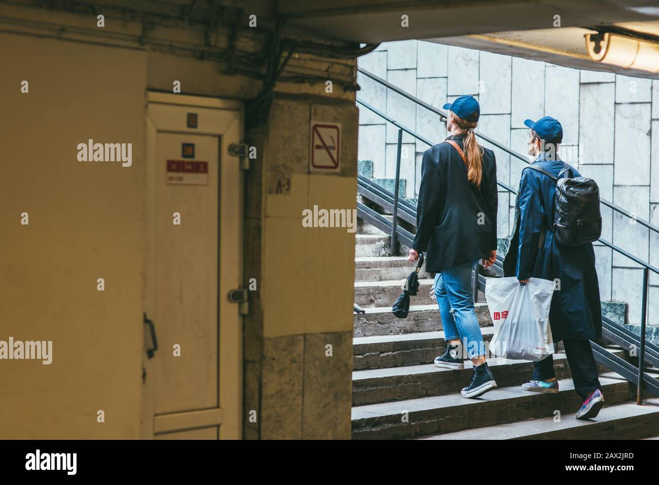 Couple going up stairs hi-res stock photography and images - Alamy