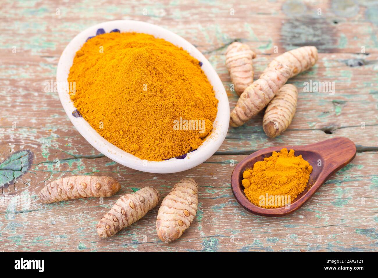 turmeric powder and roots, Asian origin plant containing curcumin has ...