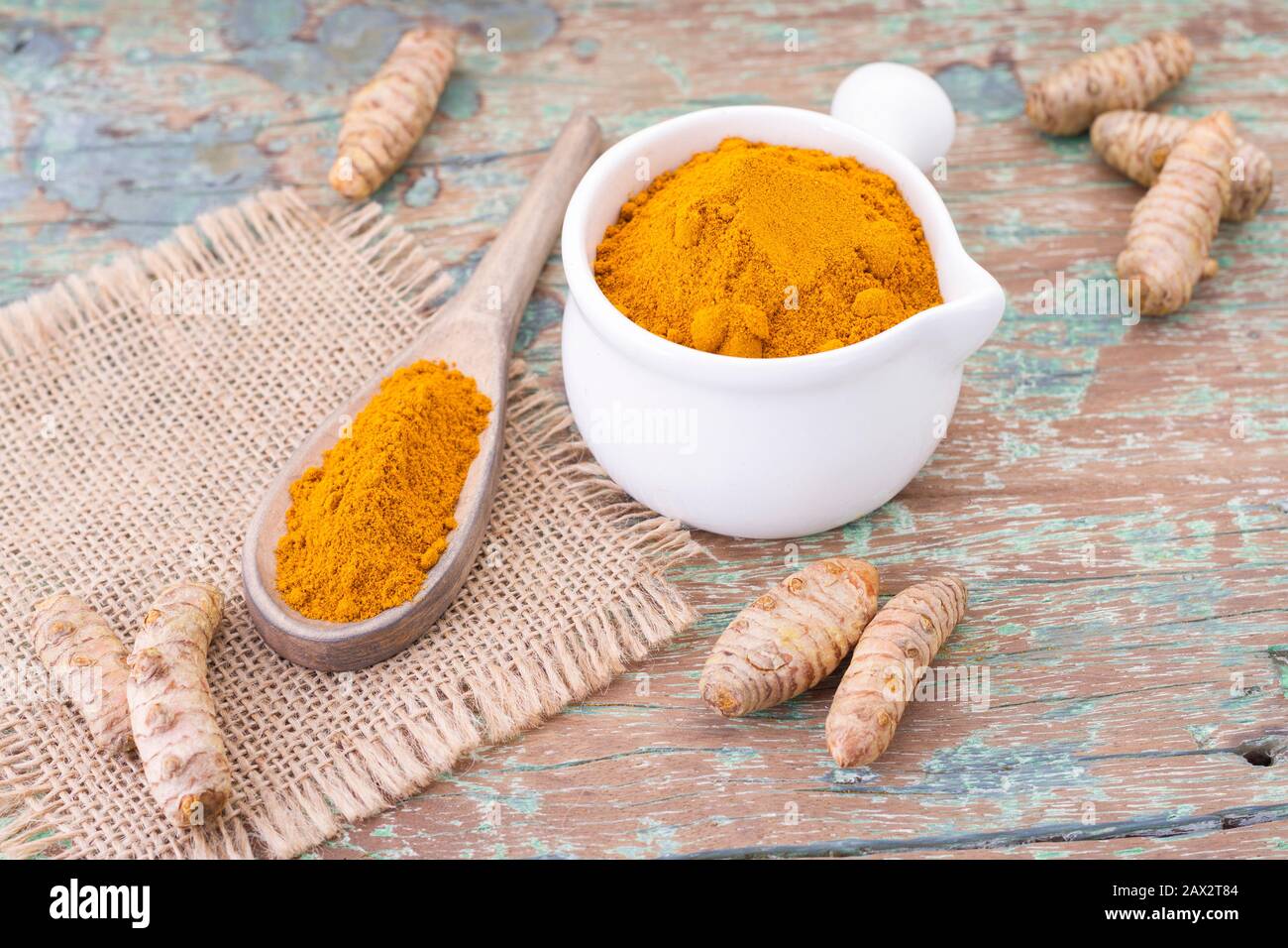 turmeric powder and roots, Asian origin plant containing curcumin has ...