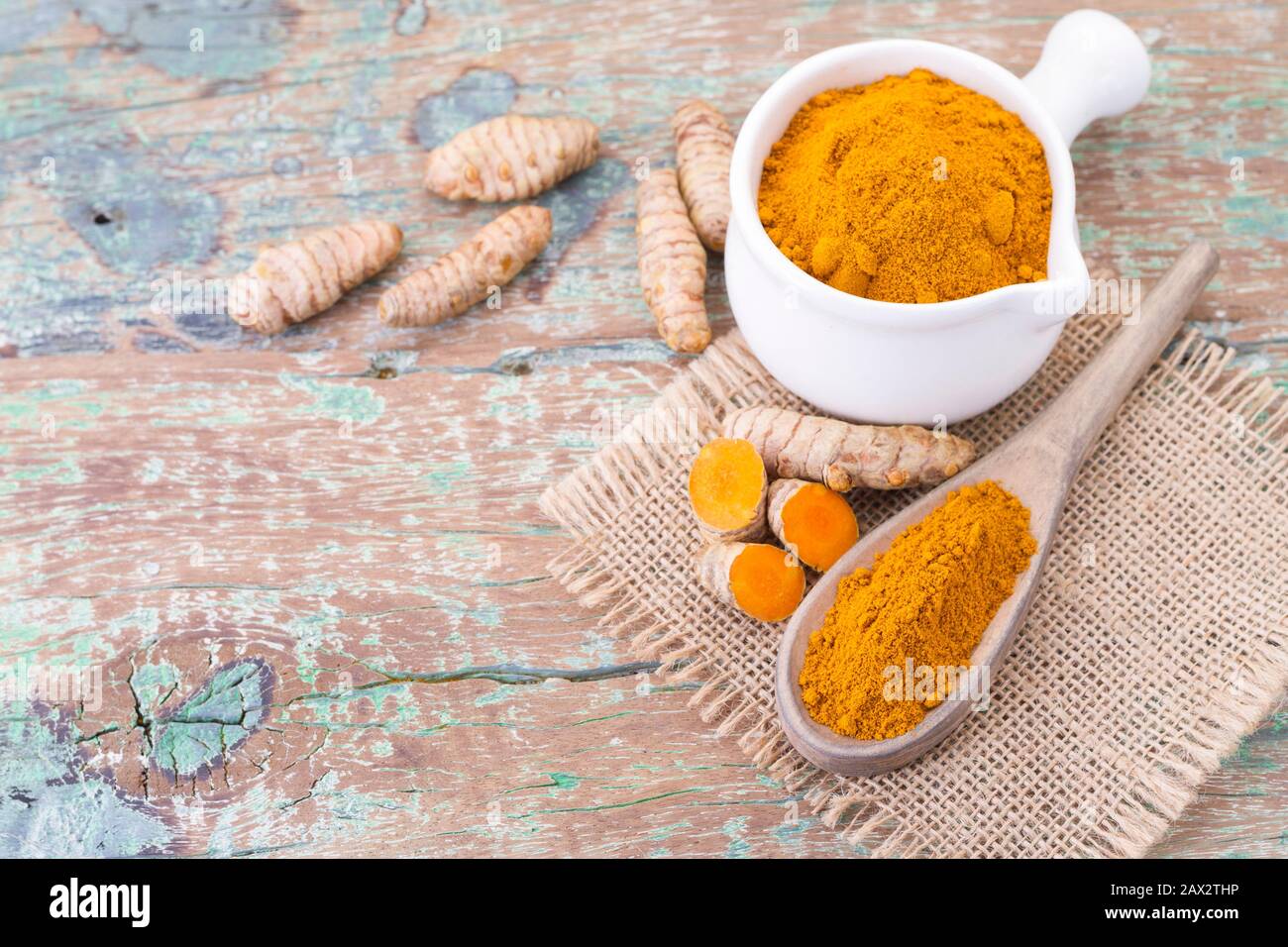 turmeric powder and roots, Asian origin plant containing curcumin has ...