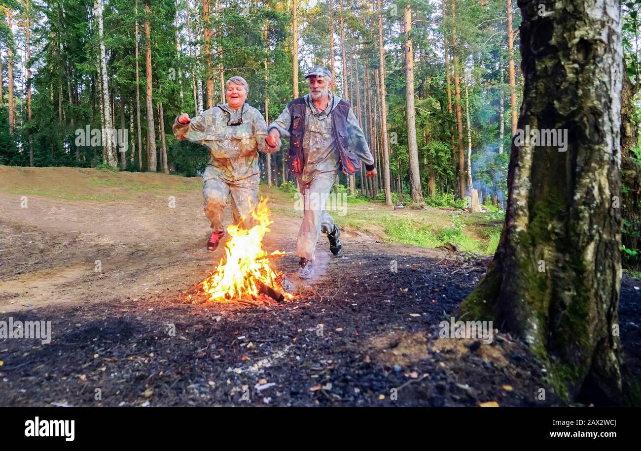 Man jumping over campfire hi-res stock photography and images - Alamy