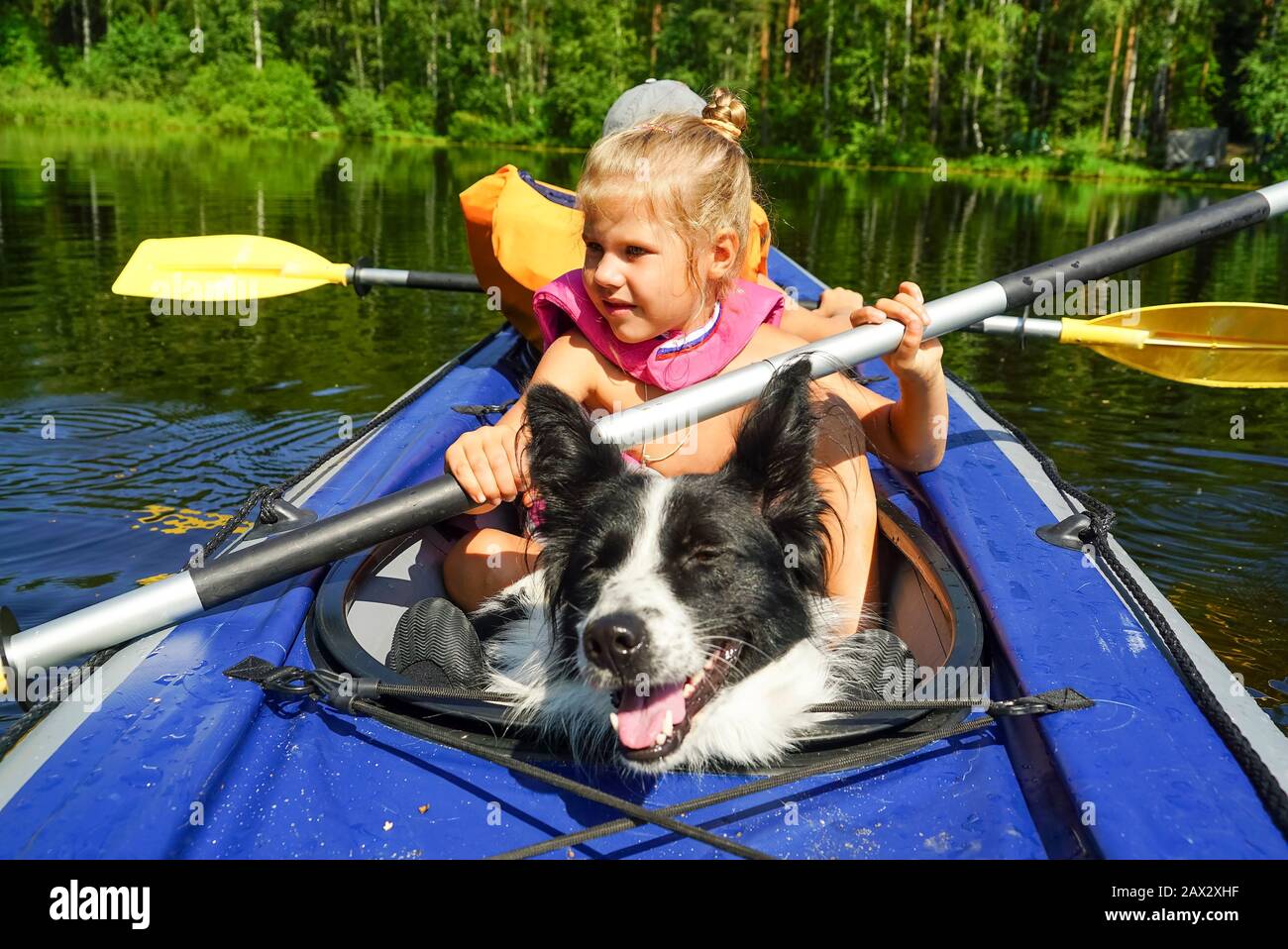 Girl on inflatable boat hi-res stock photography and images - Alamy