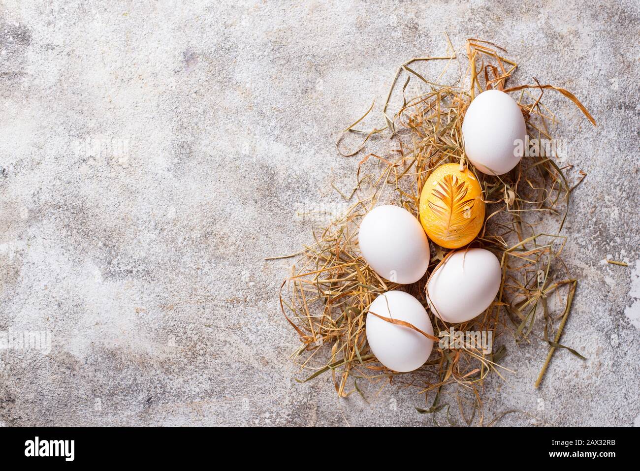 Easter chicken golden and white eggs Stock Photo - Alamy