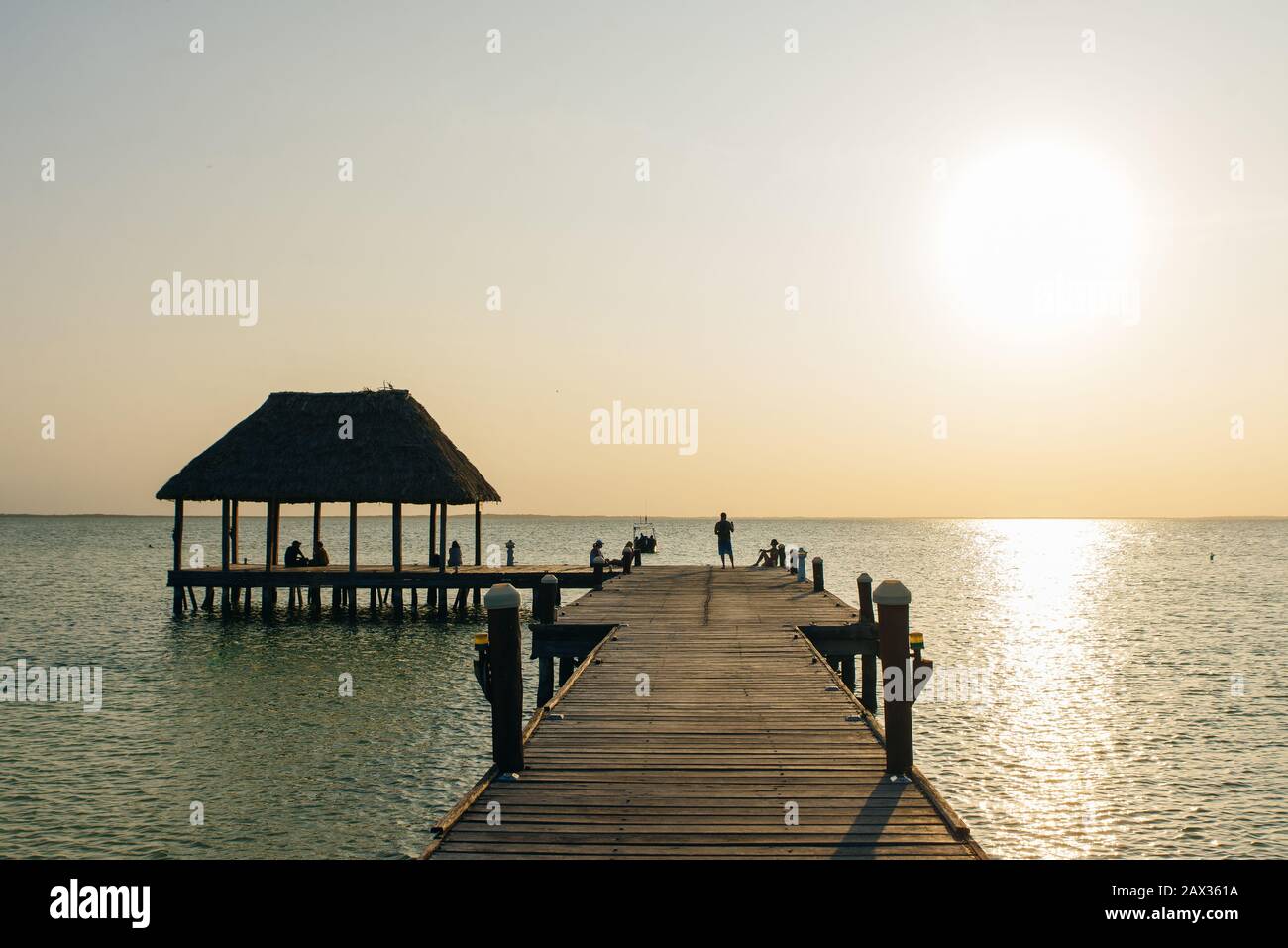 Holbox Island pier palapa sunset beach in Mexico Quintana roo Stock ...