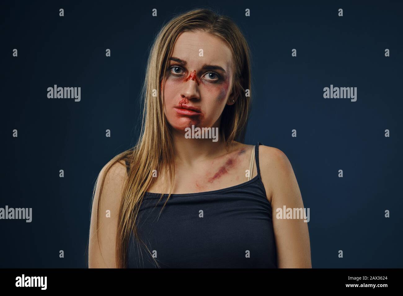 Domestic violence woman face covered hi-res stock photography and ...