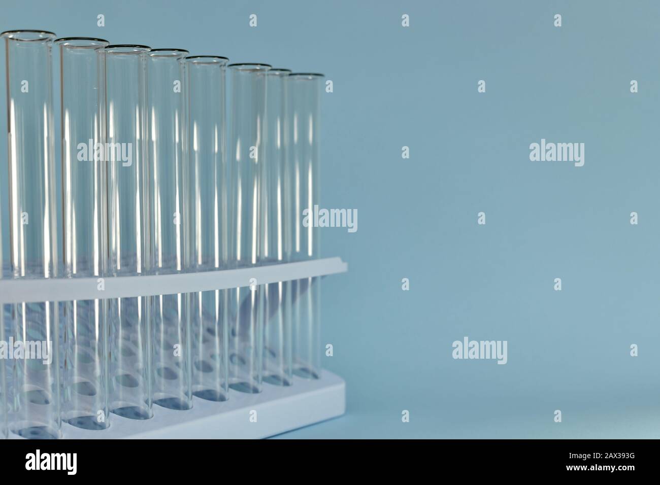 A horizontal image of removed transparent test tubes in a tray on a ...