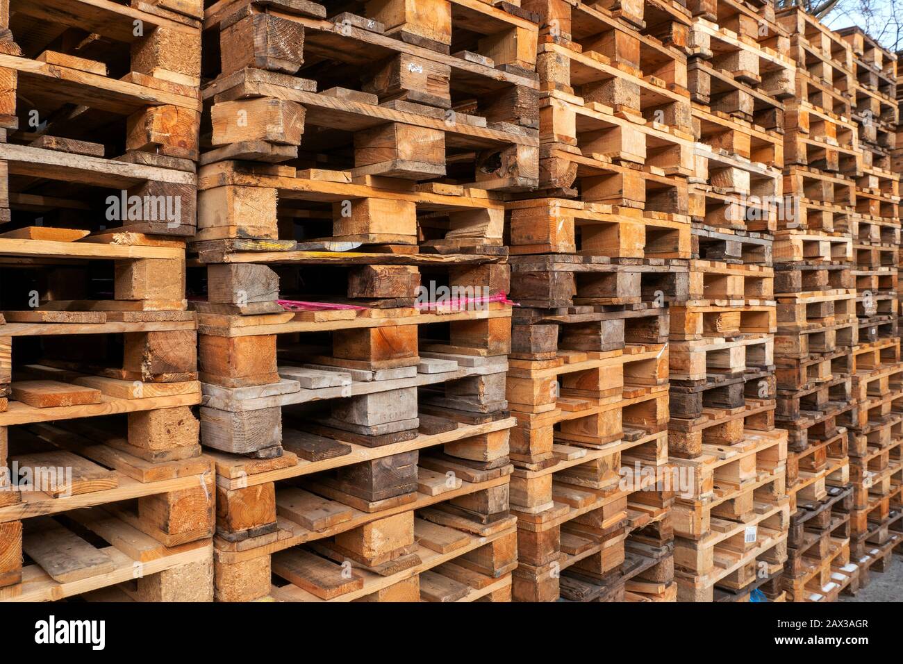 Many stacks of used wooden pallets of euro type on warehouse is ready ...
