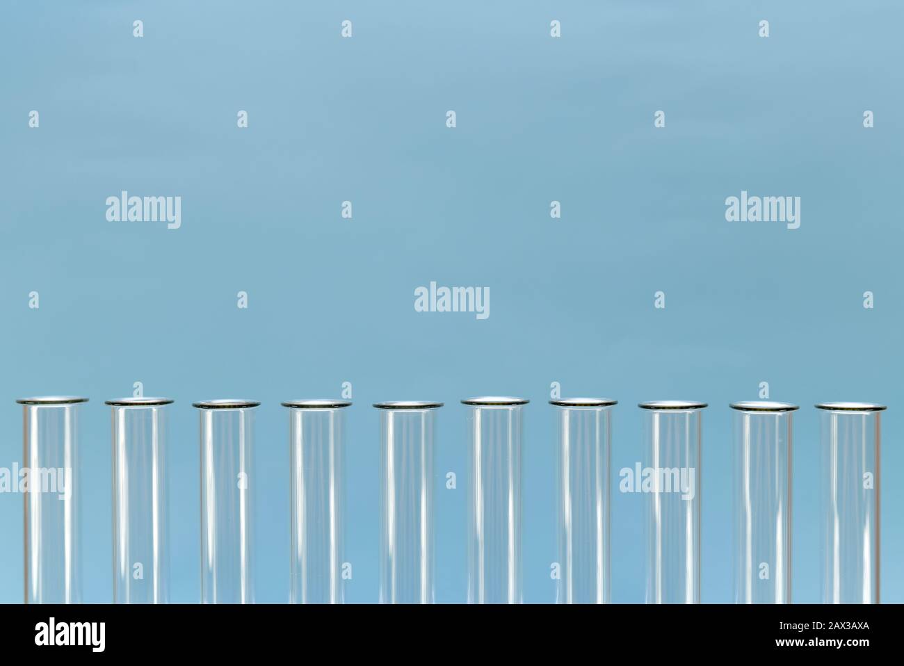 The top edge of the test tubes with a neck at the bottom is even next ...