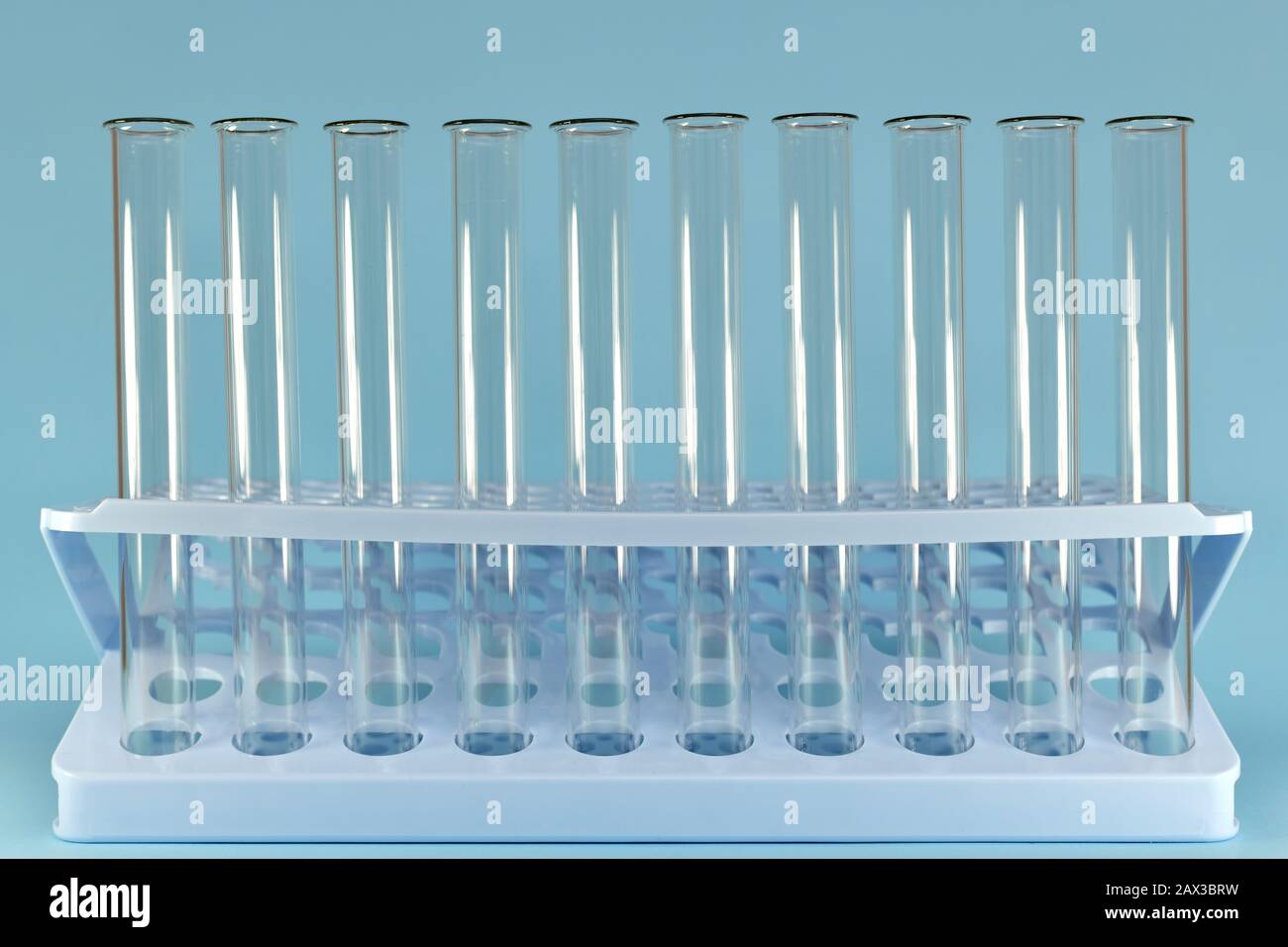 Blue tray with transparent flare of pipes on a blue background, whole ...