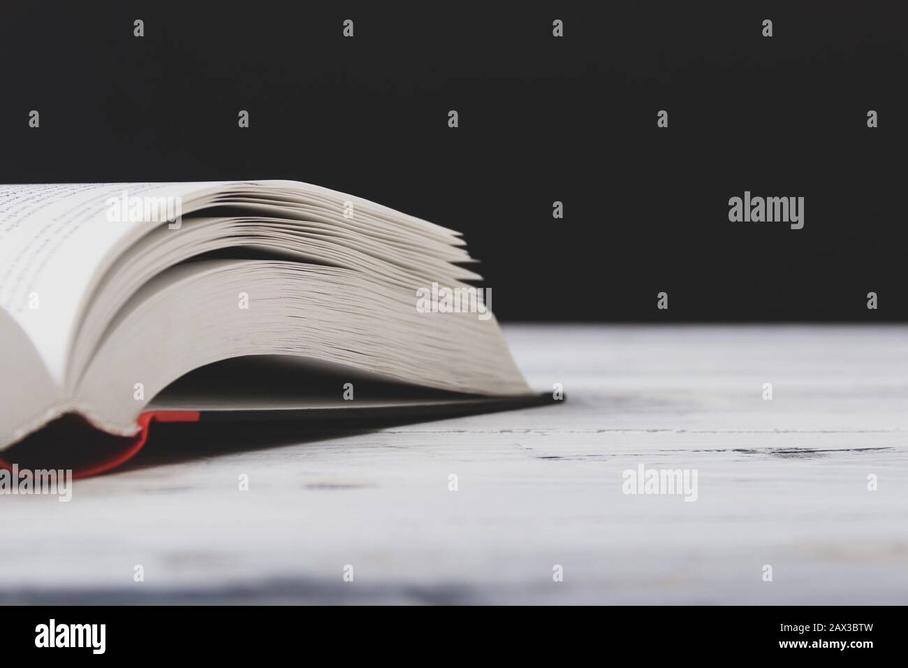 Open book on white table. Book binding background. Education concept ...