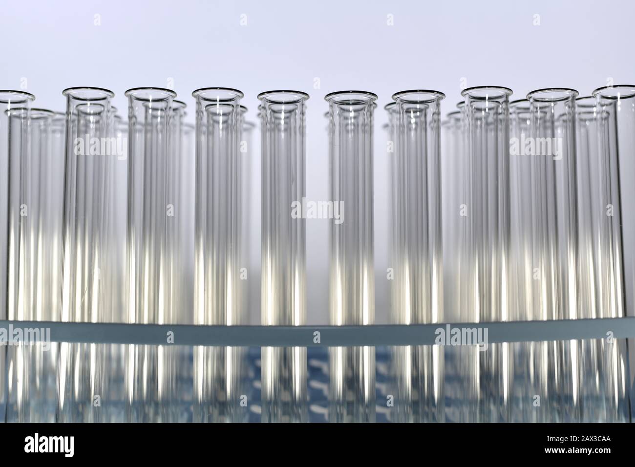 Tray with test tubes with shadows and light enlarged Stock Photo - Alamy