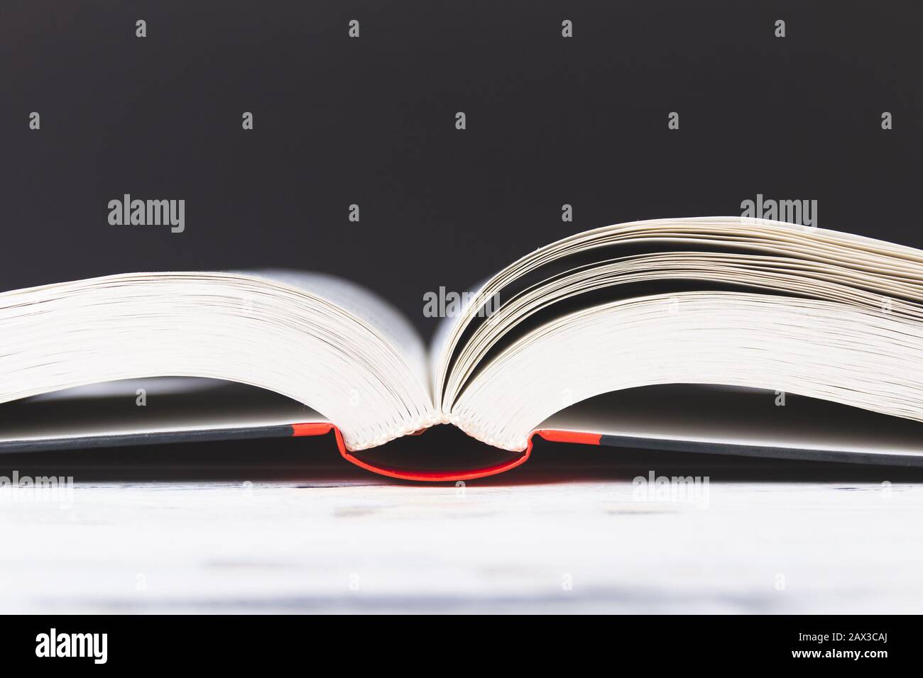 Open book on white table. Book binding background. Education concept ...