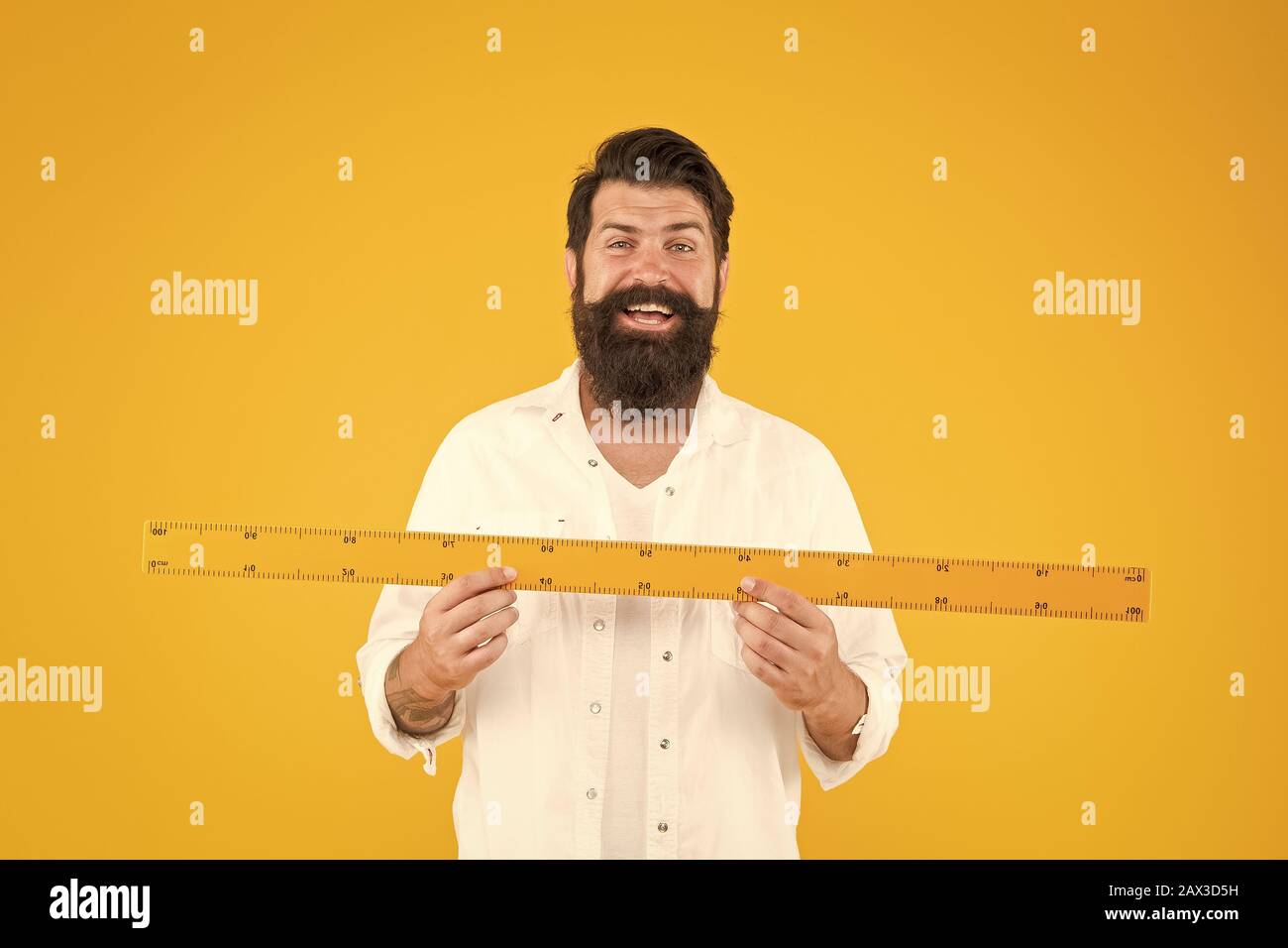 There is no substitute for a great teacher. Happy teacher holding ruler ...