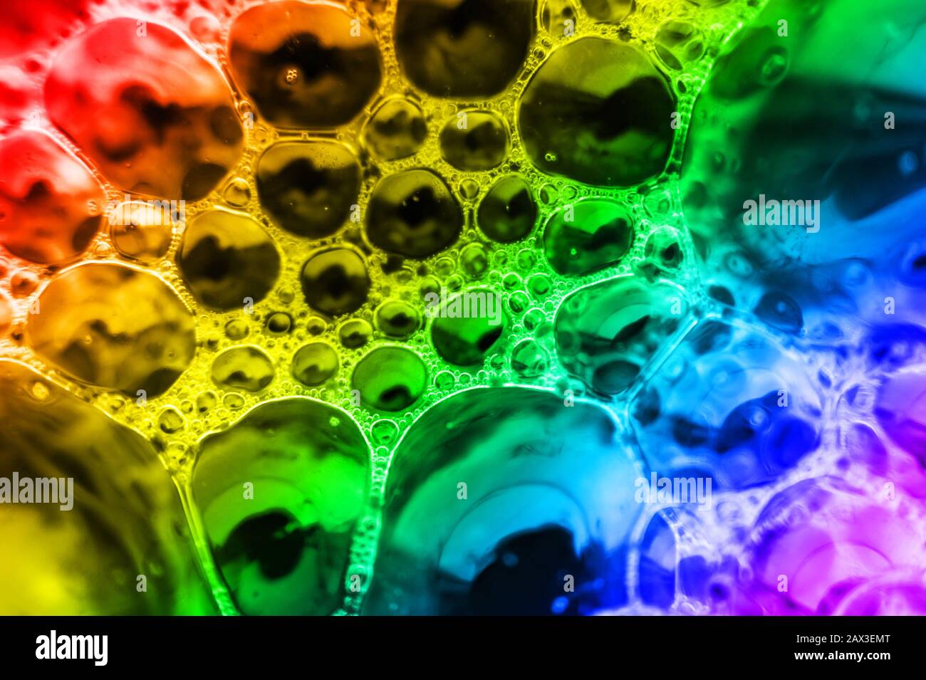 multicolored bubble pattern as a foam structure on a liquid surface ...
