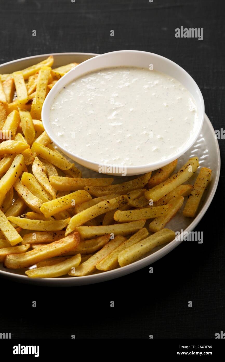 Homemade Crispy Ranch Fries, side view. Close-up Stock Photo - Alamy