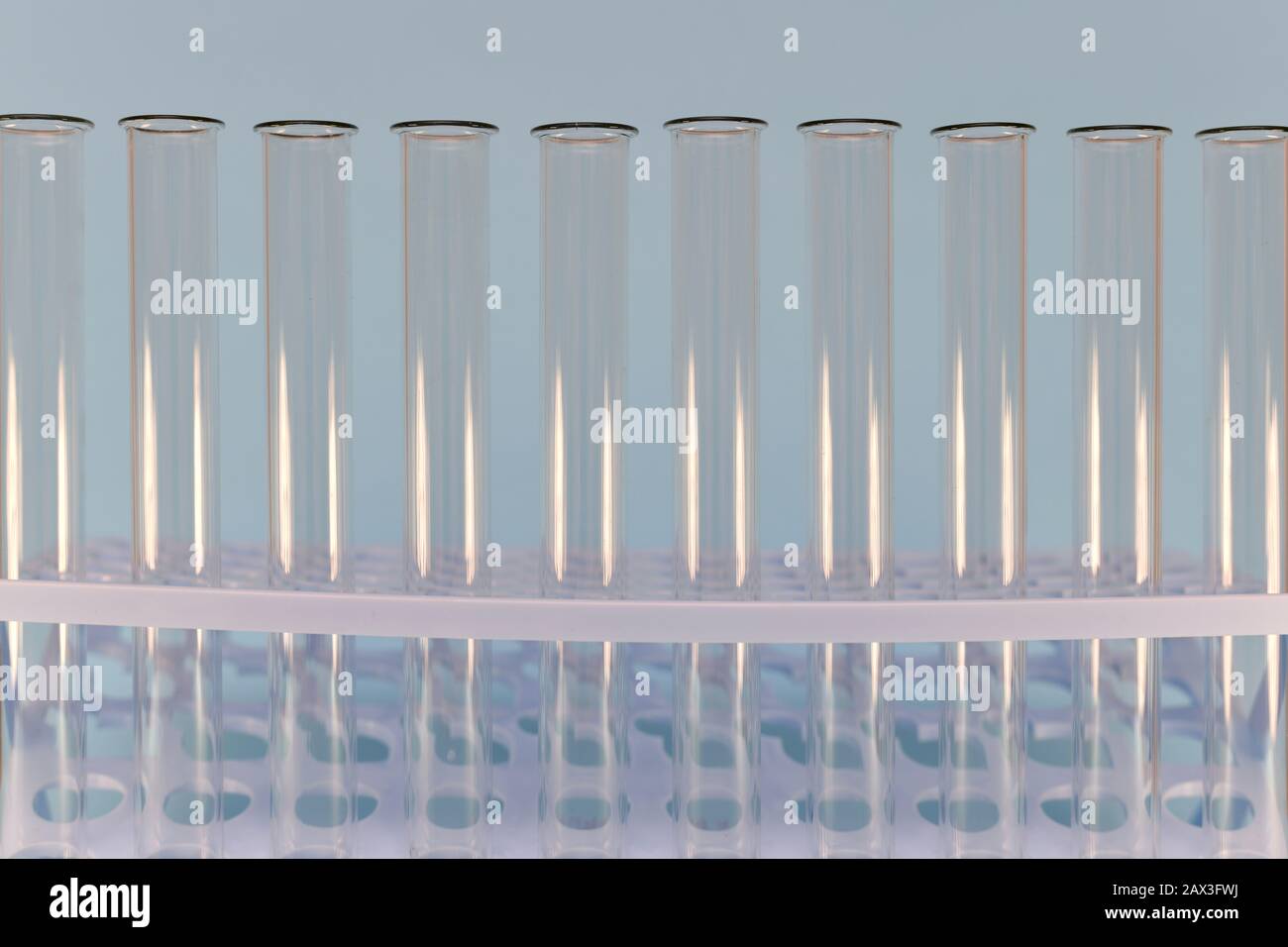 The test tubes have a vertical background almost up to the top in a ...