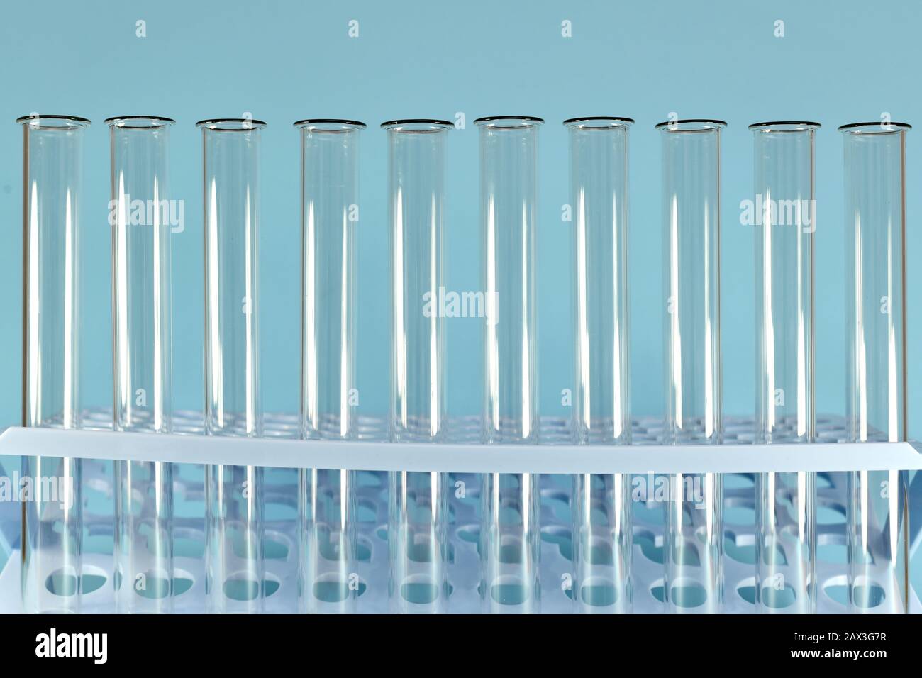 The test tubes have a vertical background almost up to the top in a ...