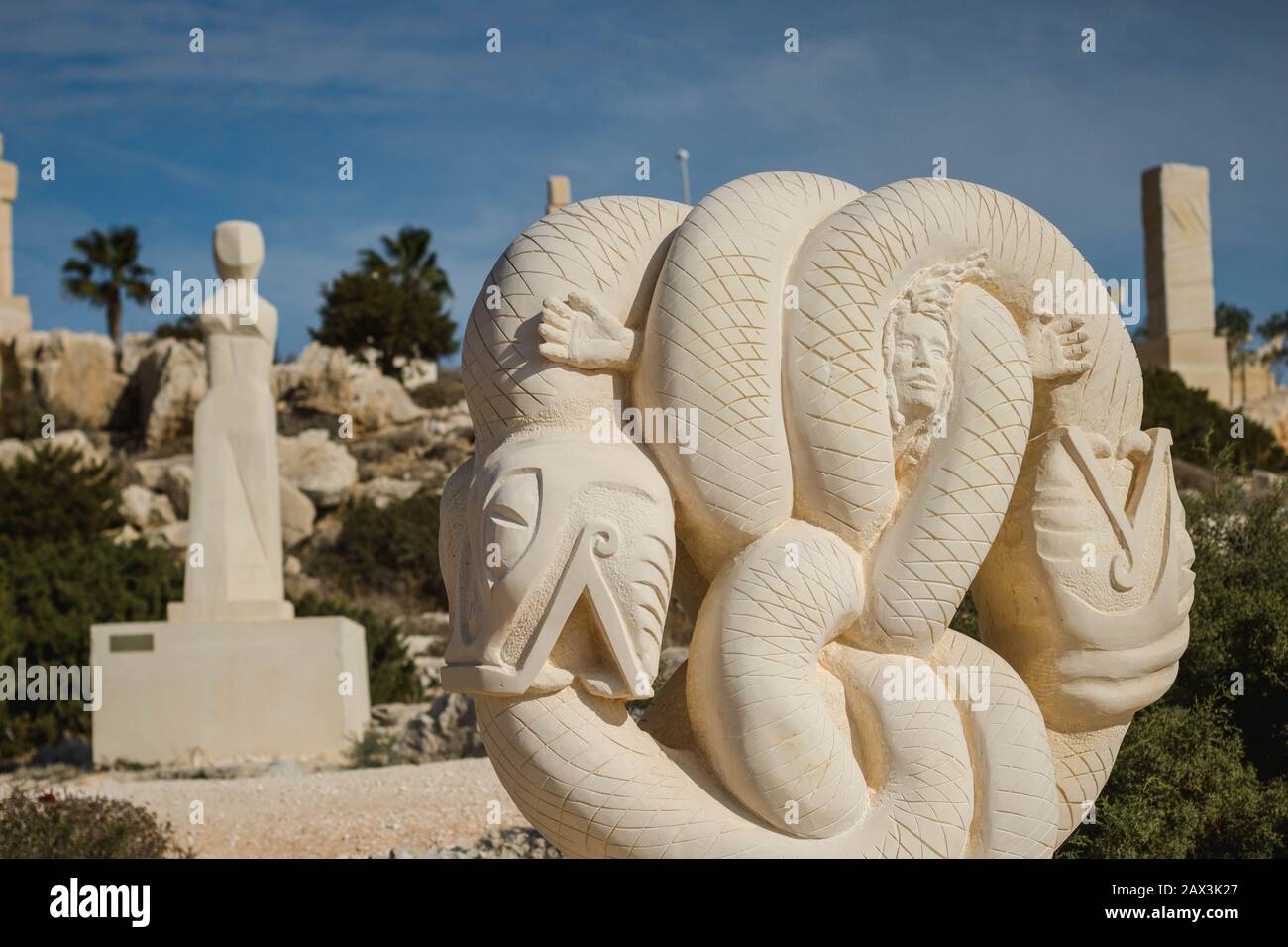 Wide angle shot of several statues next to each other Stock Photo - Alamy