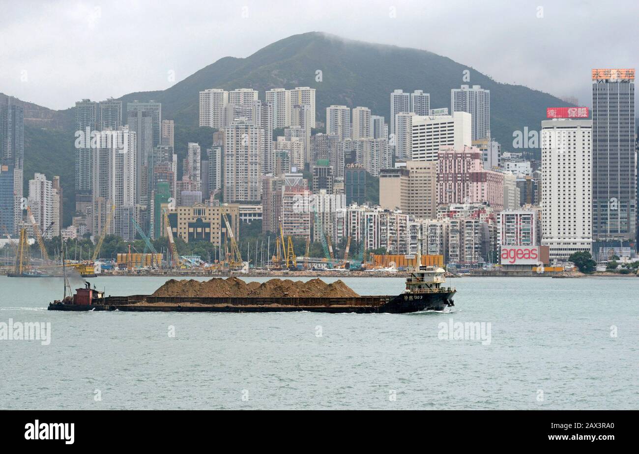 Soil carrier boat in Hong Kong harbour, Hong Kong, China Stock Photo ...
