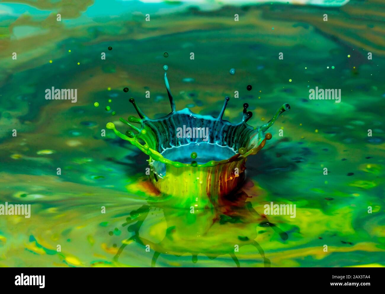 Bursts of multi-colored bright colors of paint in the form of crowns ...