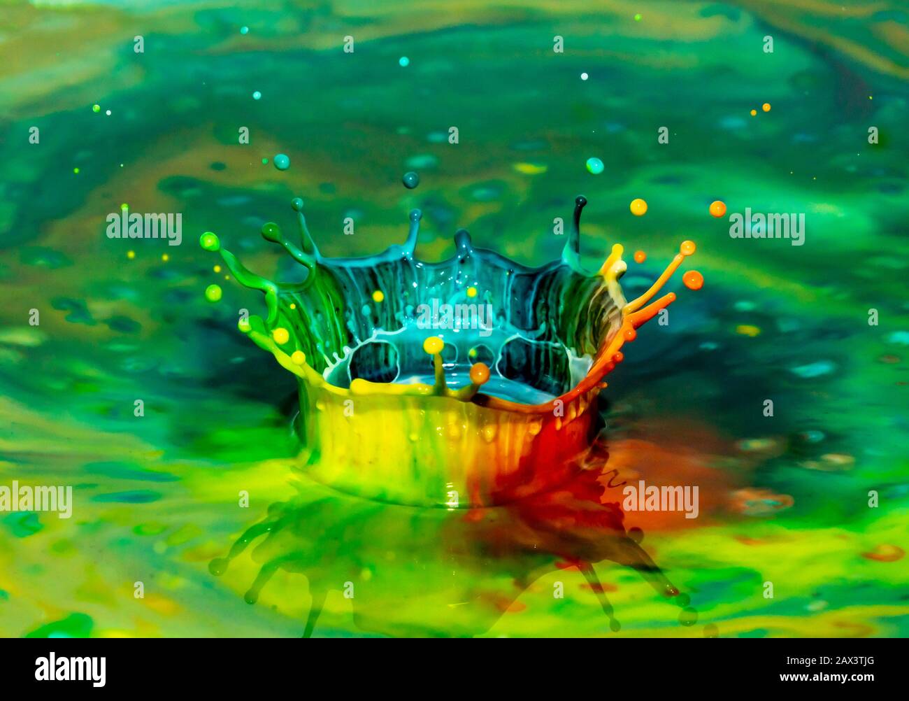 Bursts of multi-colored bright colors of paint in the form of crowns ...