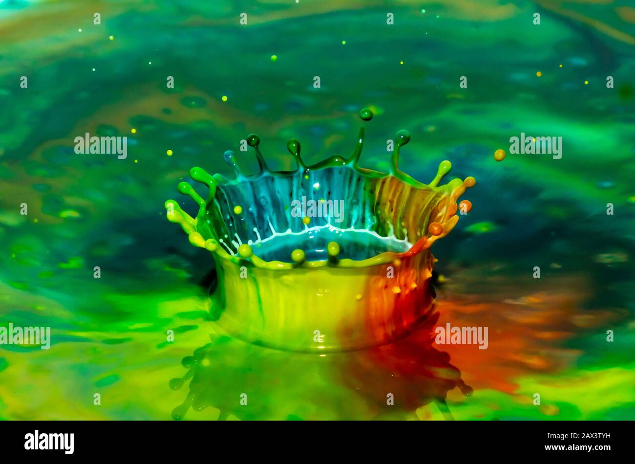 Bursts of multi-colored bright colors of paint in the form of crowns ...