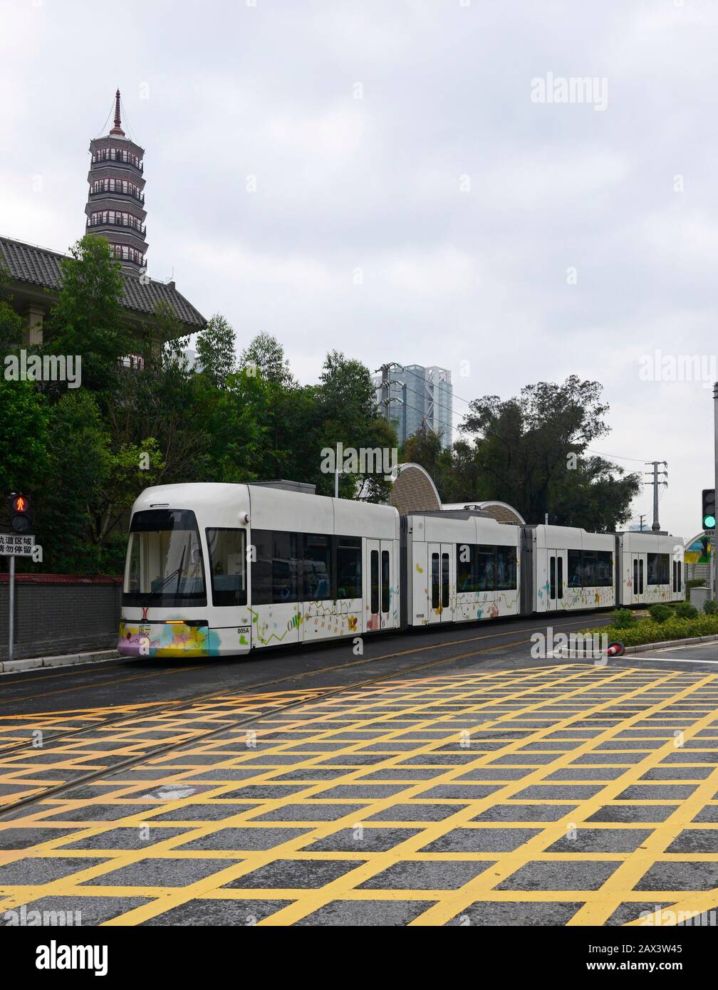 A tram stops at Pazhou pagoda station on the Haizhu tram system in ...