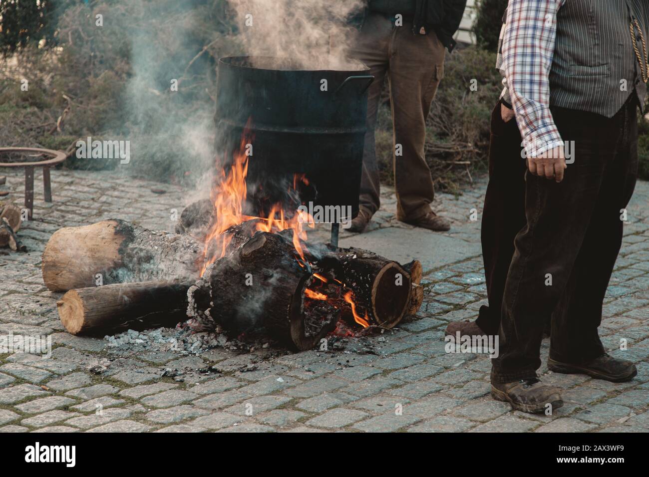 Fire burning under big pot hi-res stock photography and images - Alamy