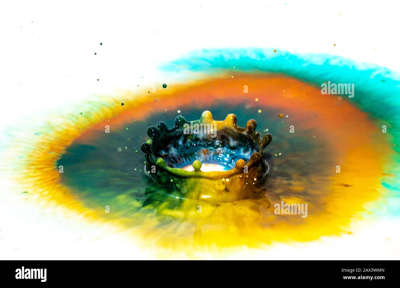 Bursts of multi-colored bright colors of paint in the form of crowns ...