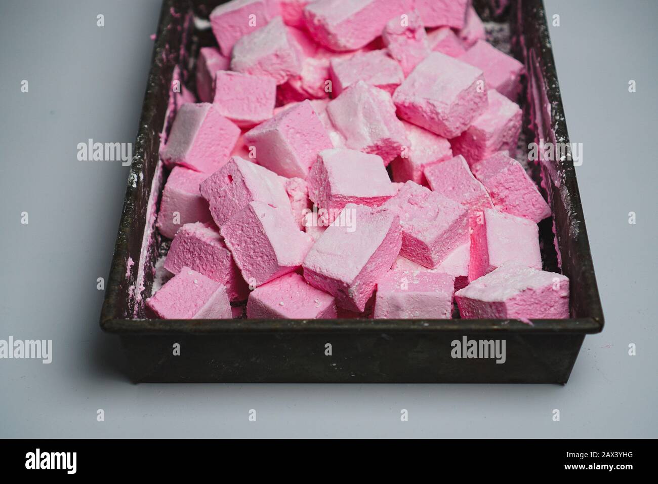 Homemade pink marshmallows in a pan Stock Photo - Alamy