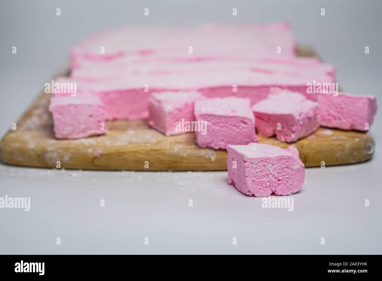 Homemade pink marshmallows on a cutting board Stock Photo - Alamy