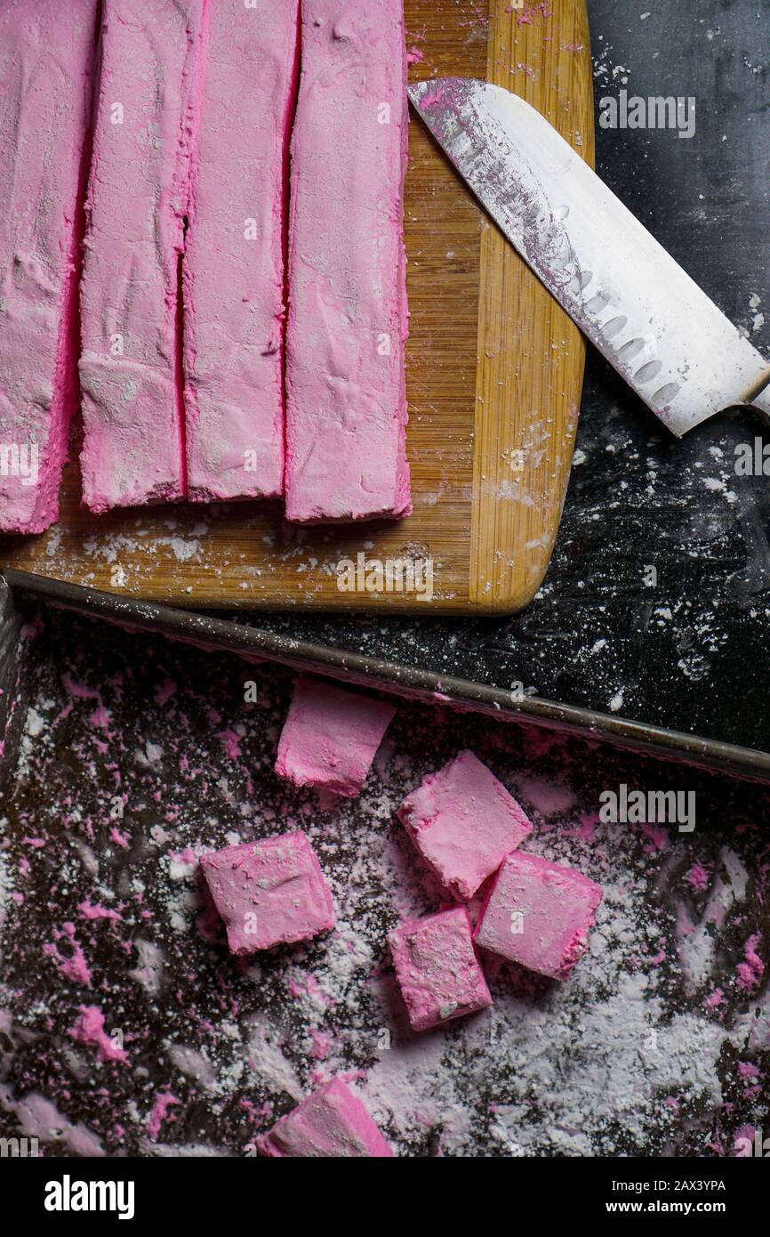 Homemade pink marshmallows on a cutting board Stock Photo - Alamy