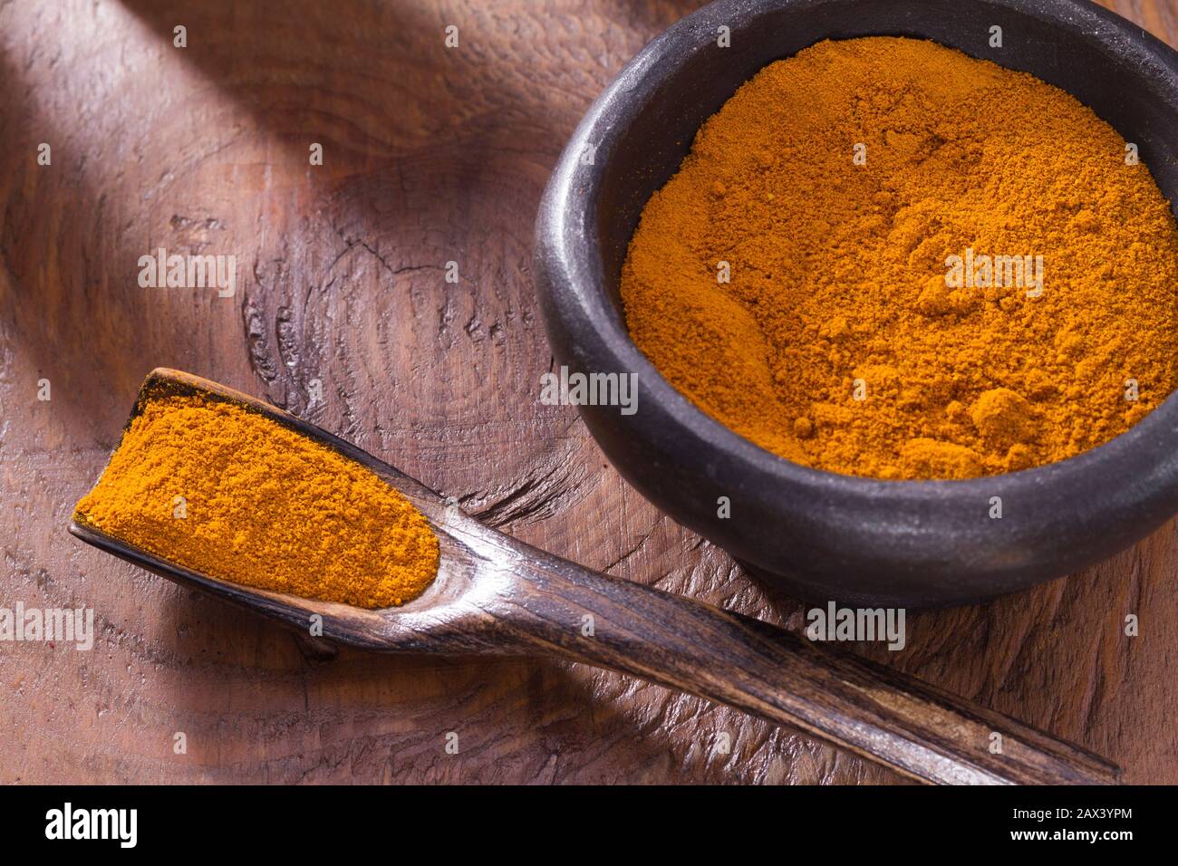 turmeric powder and roots, Asian origin plant containing curcumin has ...