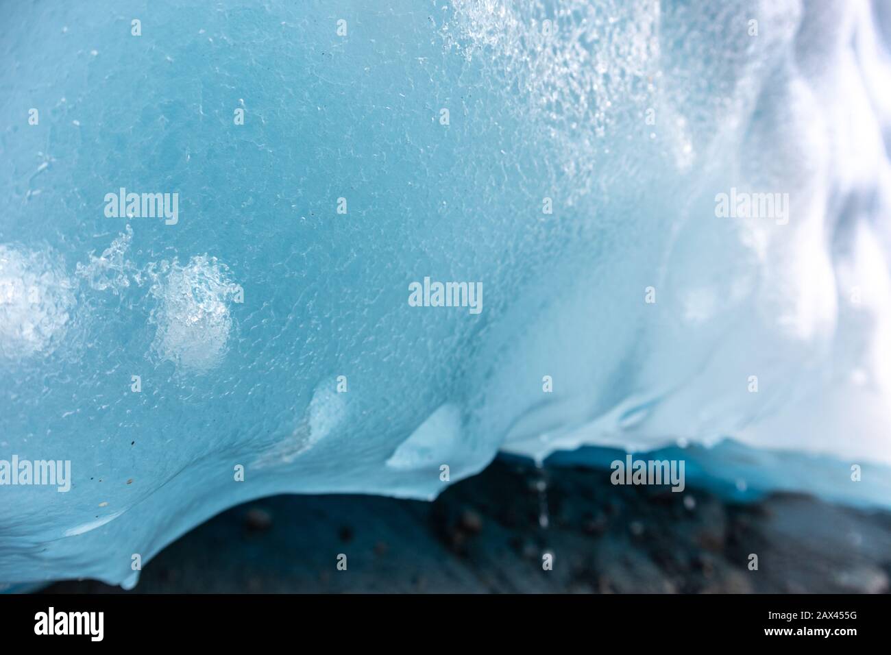 Glacier bright blue light through ice close up in Jostedalsbreen ...