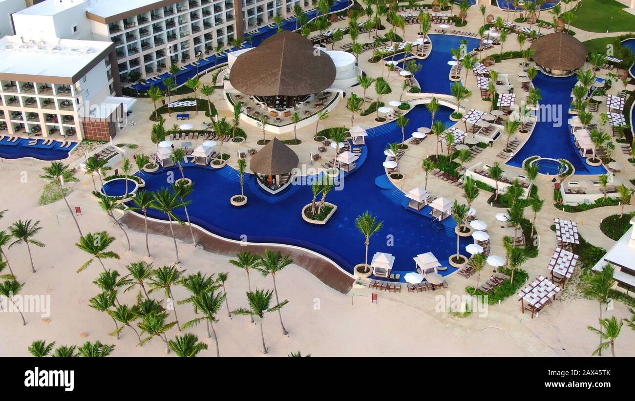 Pool area with lounge bar in luxury holiday resort, aerial view of ...