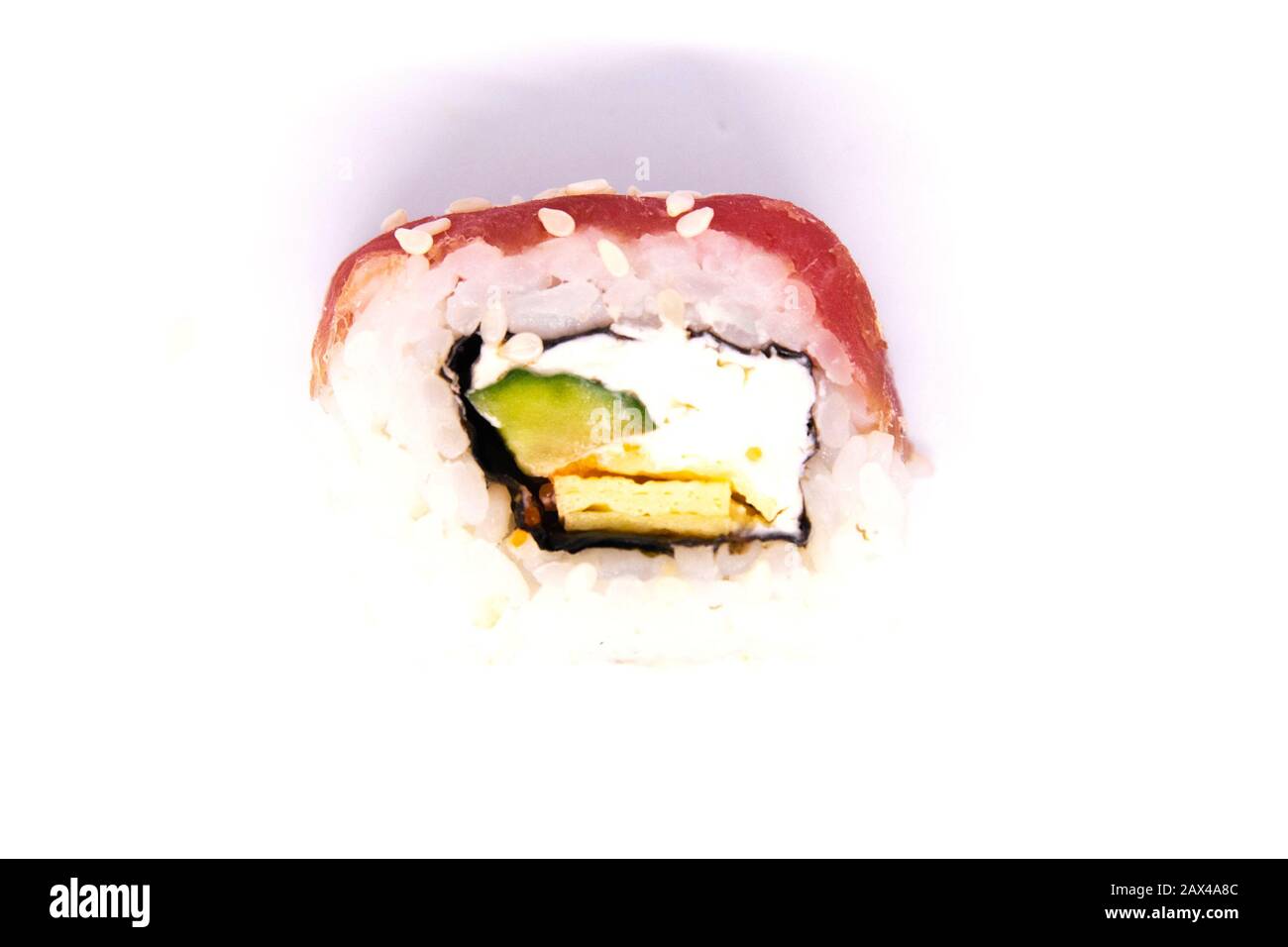 Roll maguro isolated on a black background Stock Photo - Alamy