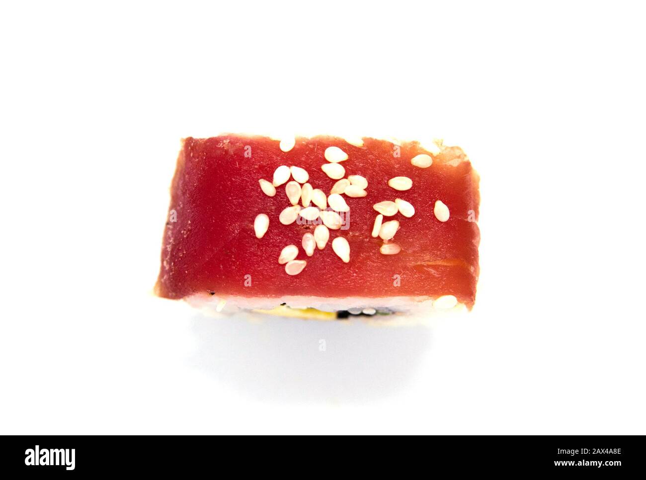 Roll maguro isolated on a black background Stock Photo - Alamy